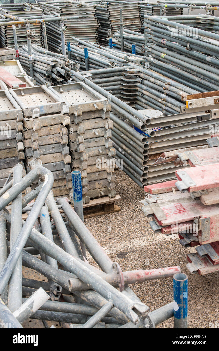 Assorted construction materials stored in piles Stock Photo - Alamy