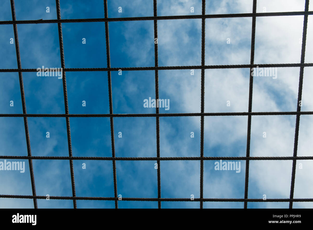 Ready steel rod structure on a building site against the background of ...
