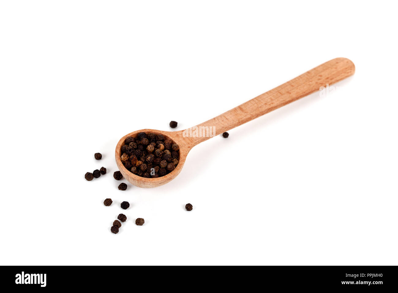 black pepper in wooden spoon isolated on white background Stock Photo ...