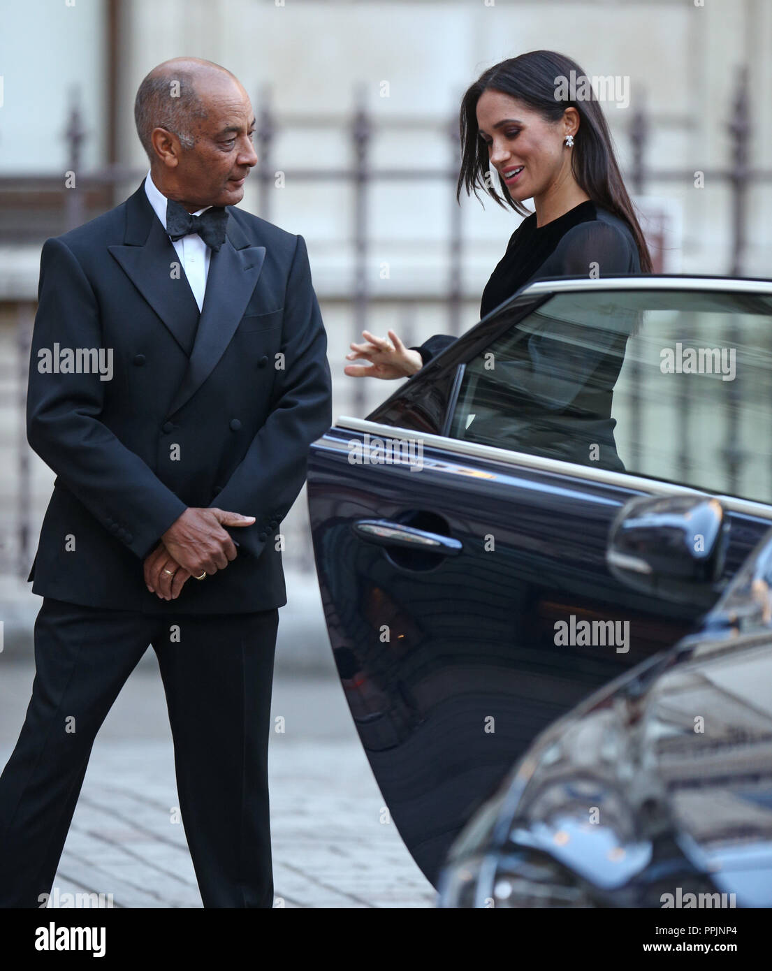 The Duchess of Sussex closes the door of the car she arrived in, as she ...