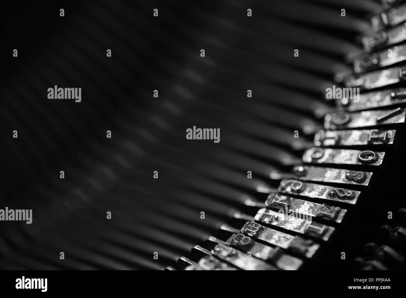 Different small metal elements of an old typewriter Stock Photo - Alamy