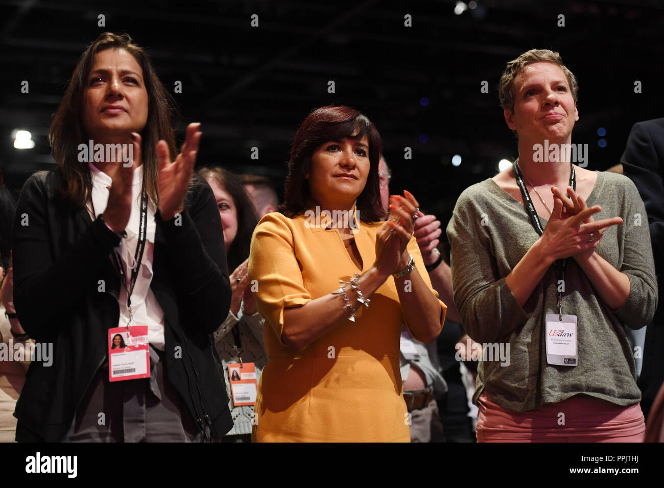 Labour leader Jeremy Corbyn's wife Laura Alvarez (centre) applauds as ...