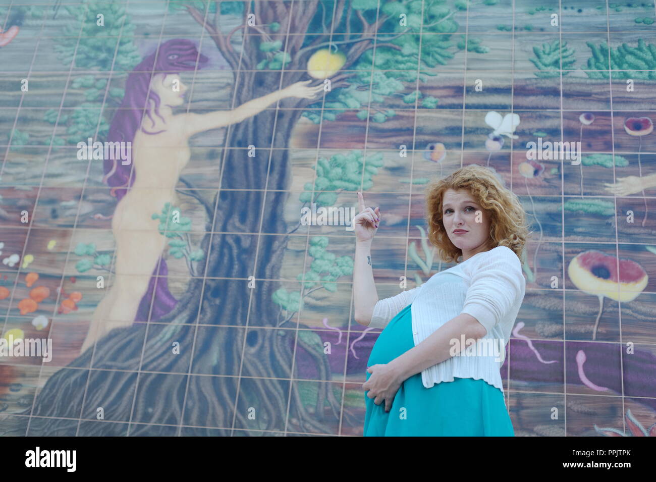 pregnancy woman with "The Fall" story , bible Stock Photo - Alamy