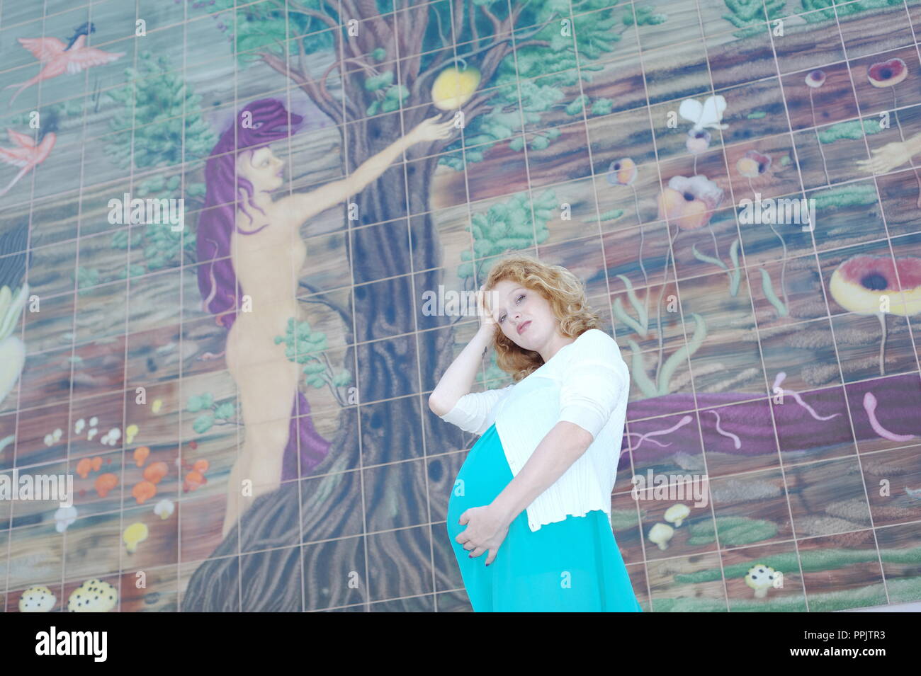 pregnancy woman with "The Fall" story , bible Stock Photo - Alamy