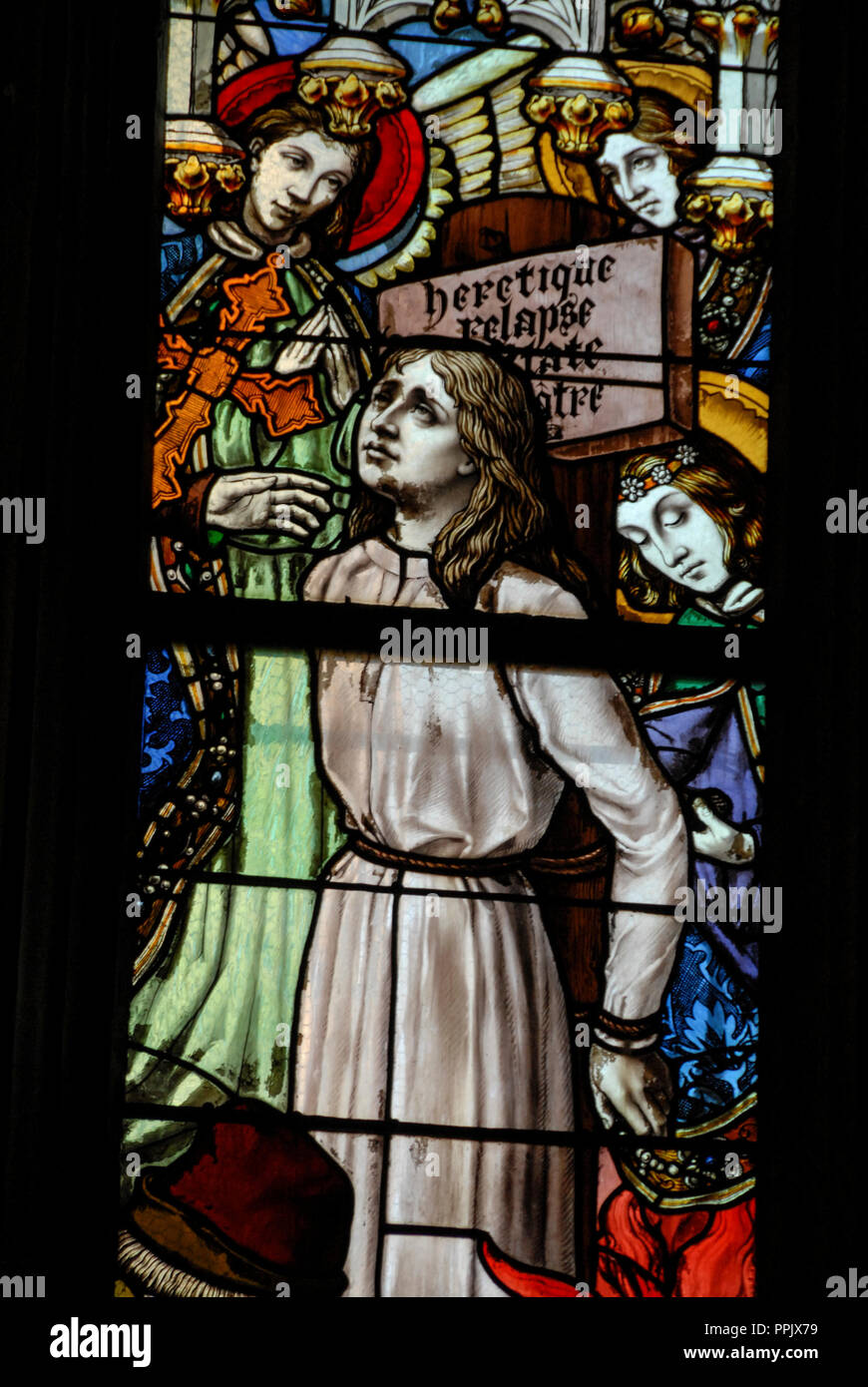 The stained glass windows portraying Joan of Arc's life from seeing the ...