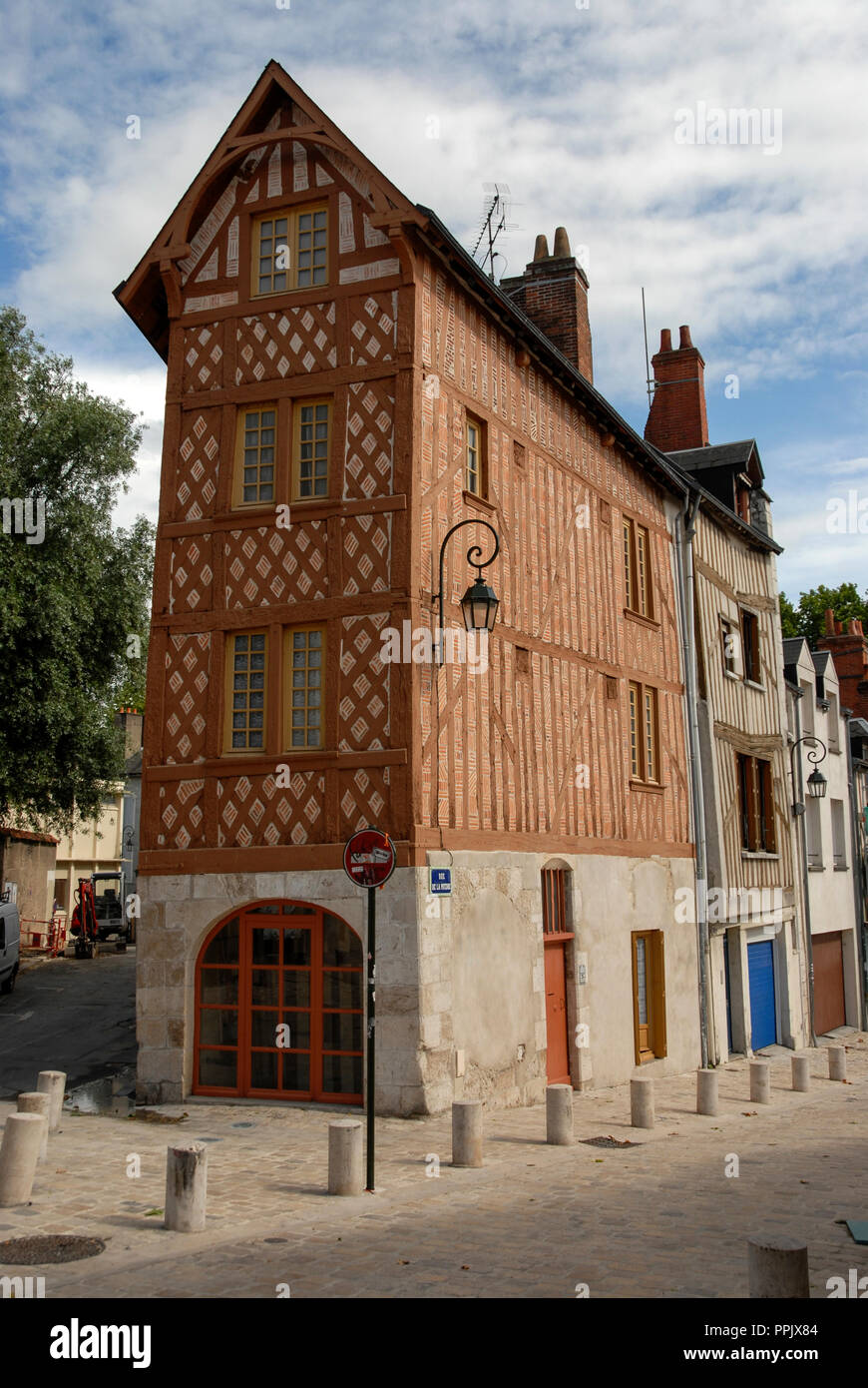 Medieval buildings in Rue de la Poterne in the old quarter of the city ...