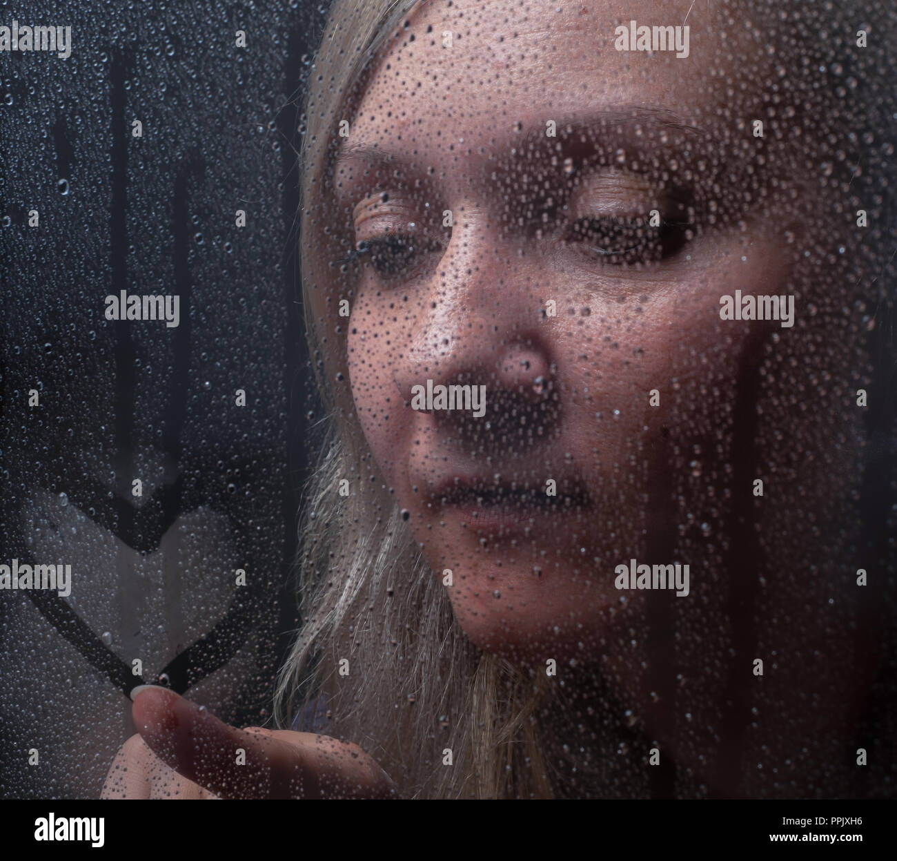 Naturally beautiful millennial woman at raining autumn day Stock Photo ...