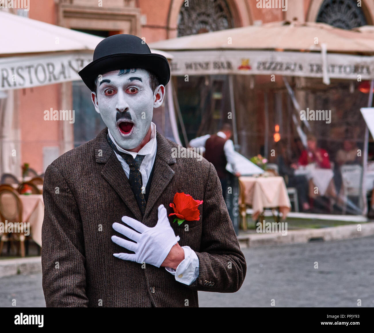 Italy, Rome, March 8/ 2018, Mime dressed as Charlie Chaplin in Piazza ...