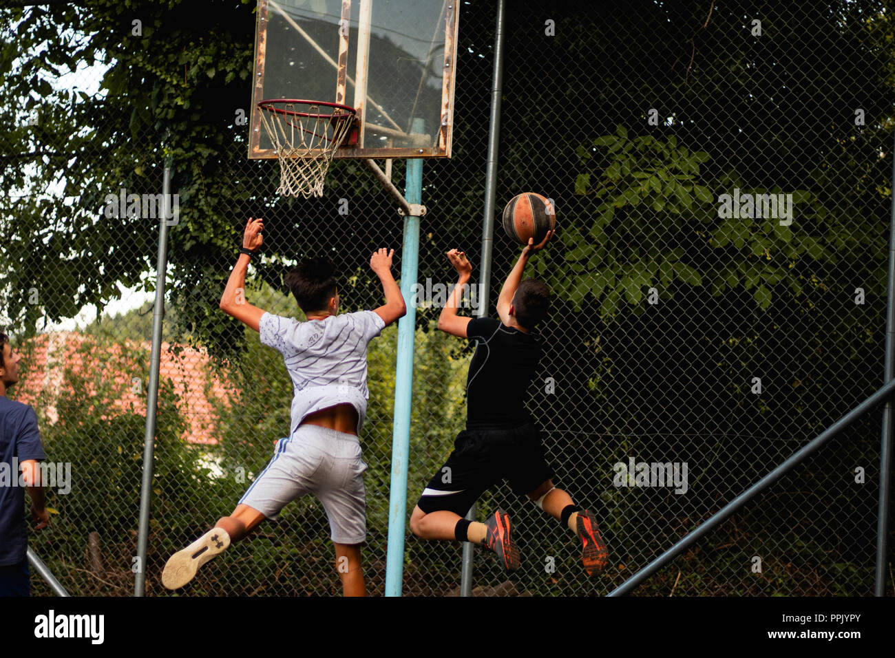 Basketball players doing a Lay-Up. Shot in Karpenisi,Greece Stock Photo ...
