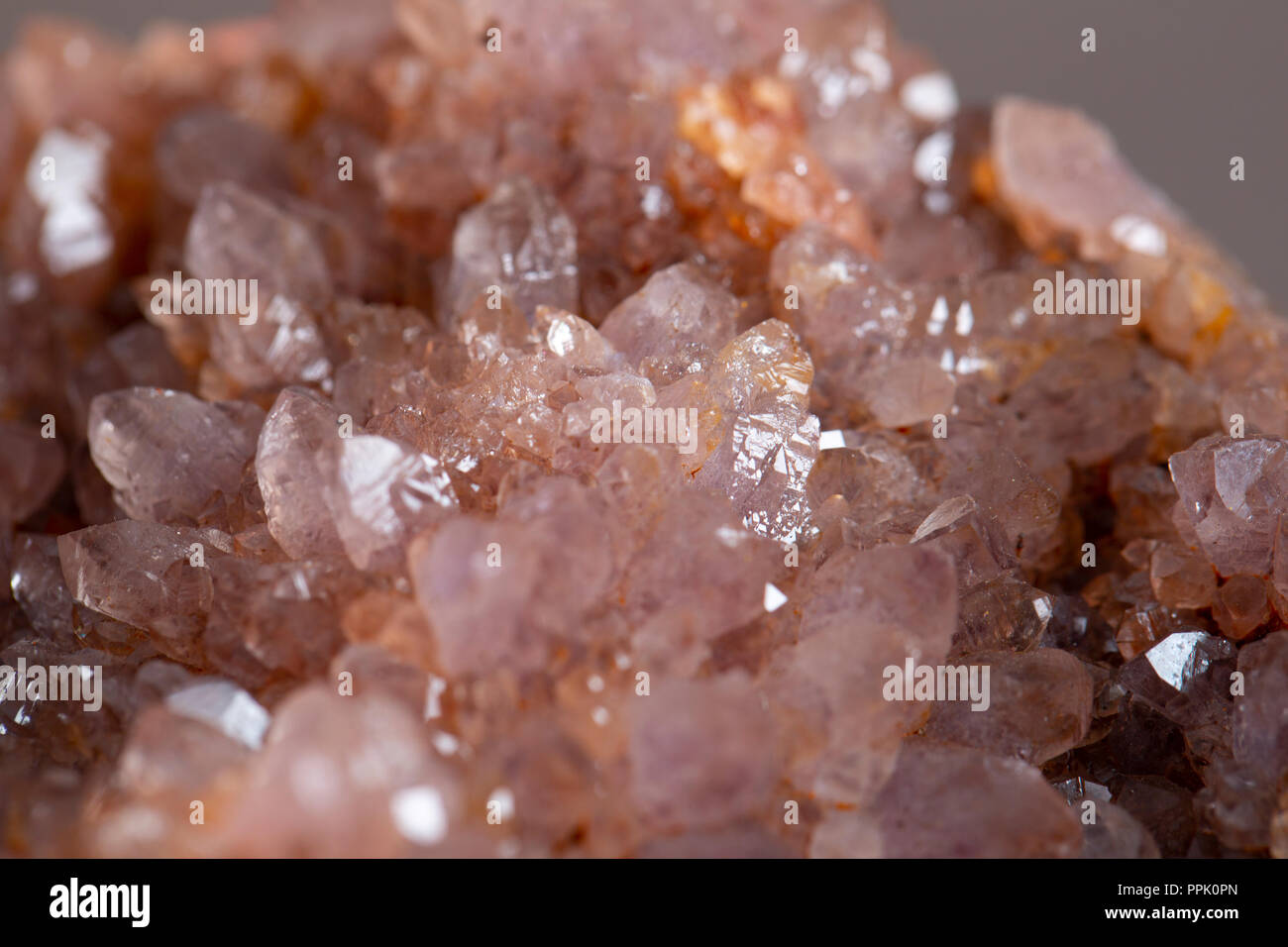 Natural Druse of amethyst on a white background stone Stock Photo - Alamy