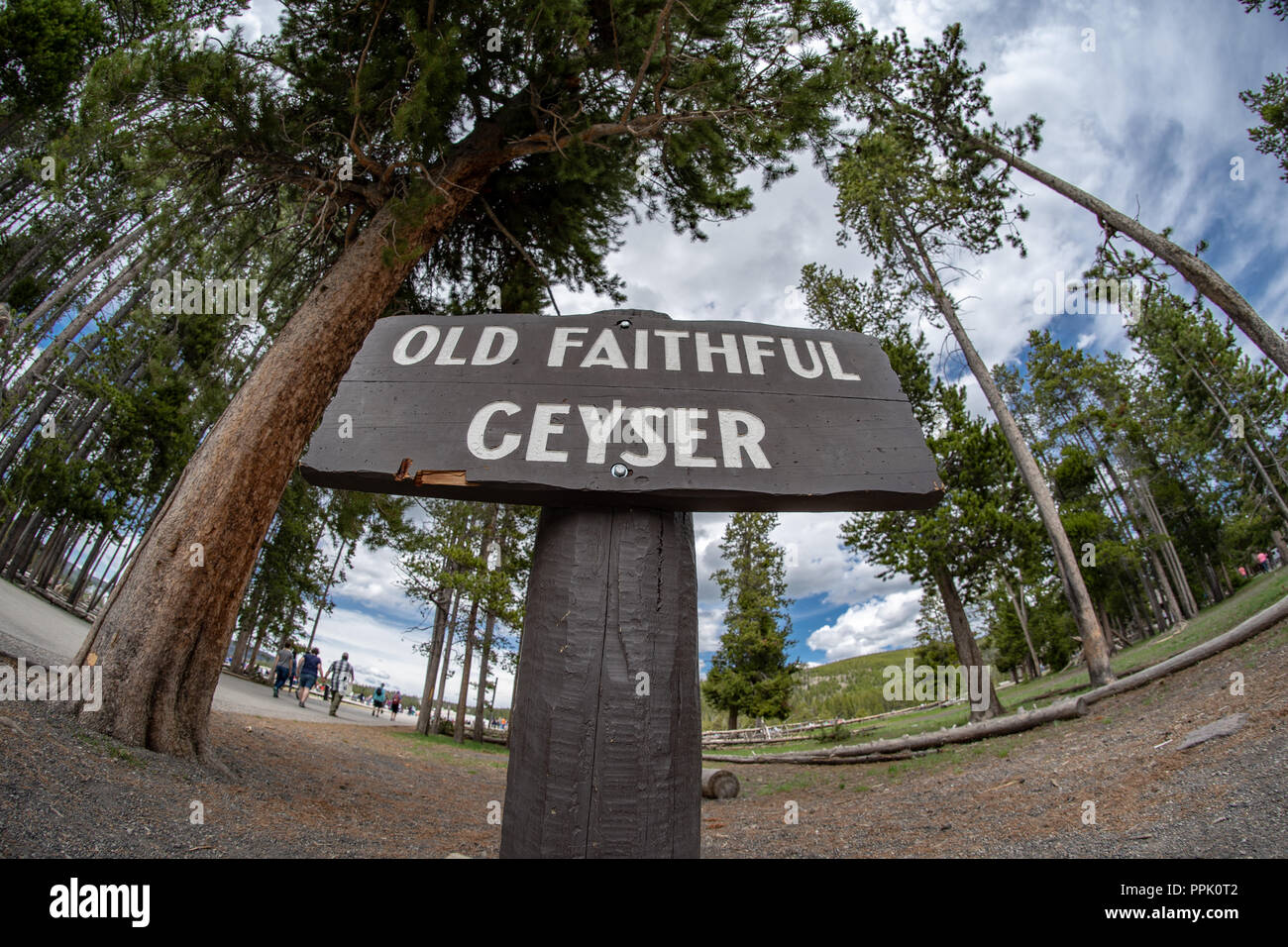 Old Faithful Geyser - US National Park sign with a fisheye lens view ...