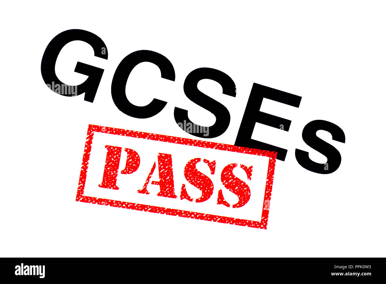 A GCSEs heading stamped with a red PASS rubber stamp Stock Photo - Alamy