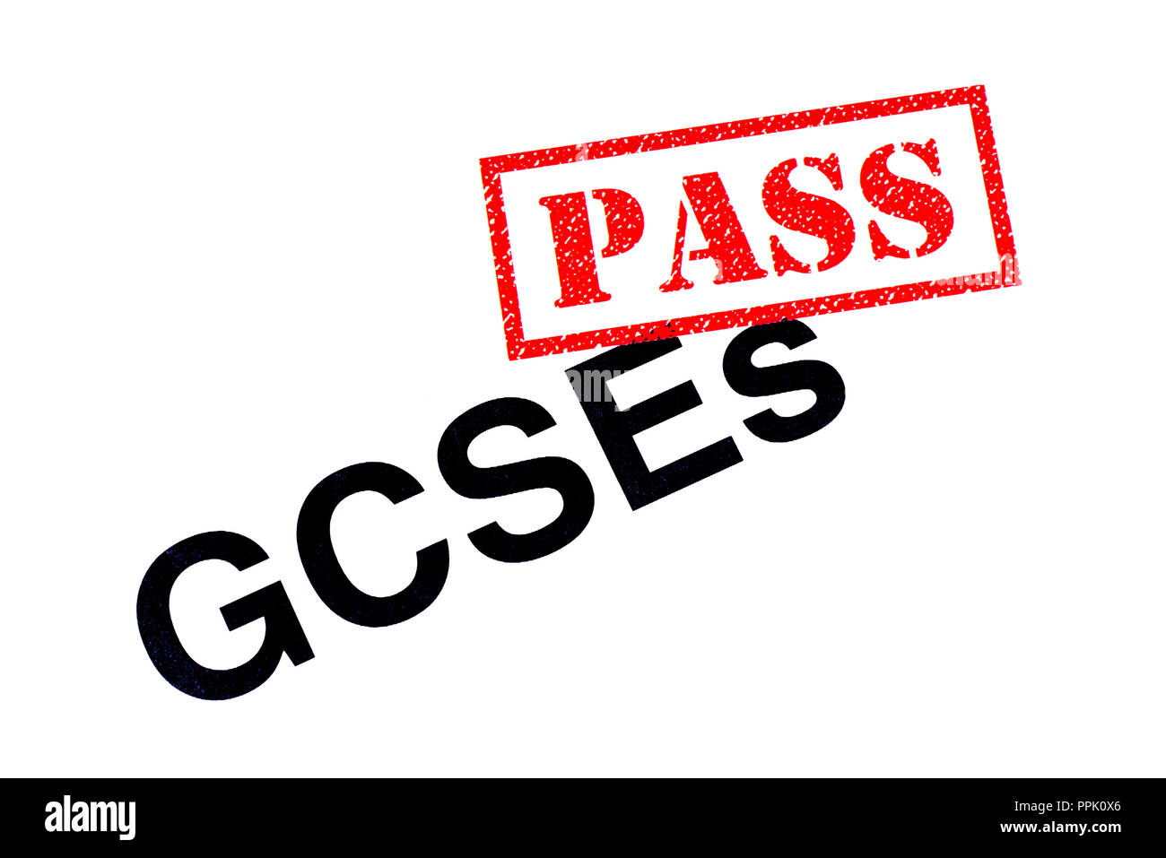 A GCSEs heading stamped with a red PASS rubber stamp Stock Photo - Alamy