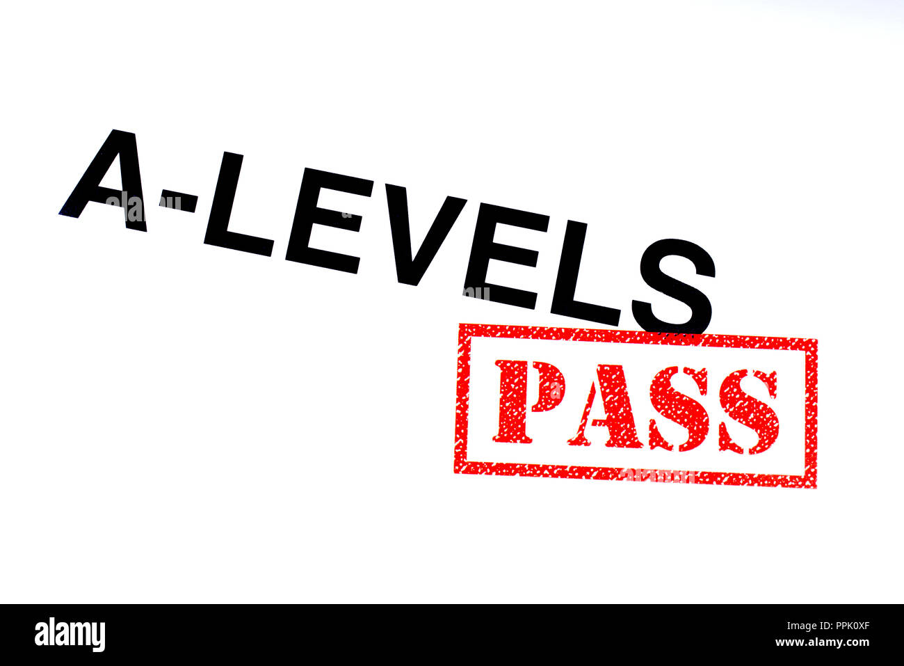 A-Levels heading stamped with a red PASS rubber stamp Stock Photo - Alamy