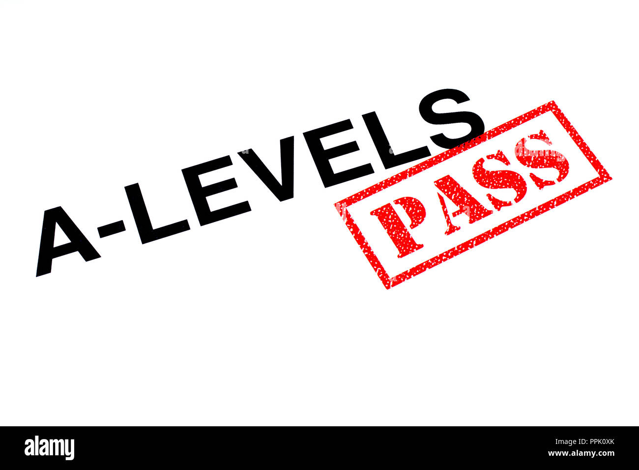 A-Levels heading stamped with a red PASS rubber stamp Stock Photo - Alamy