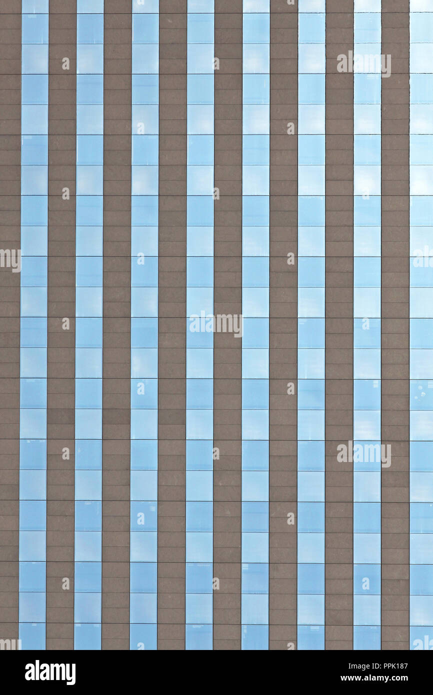 Blue glass vertical lines facade at skyscraper Stock Photo - Alamy