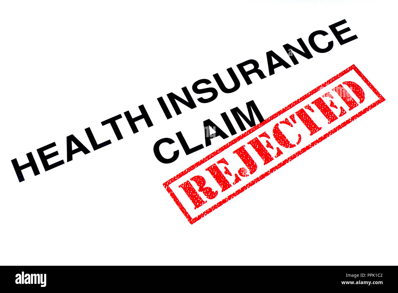 Health Insurance Claim heading stamped with a red REJECTED rubber stamp ...