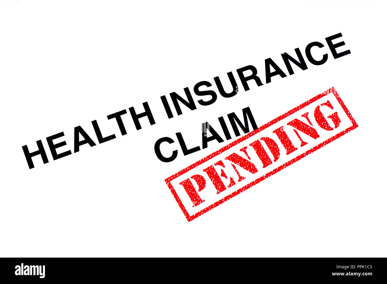 Health Insurance Claim heading stamped with a red PENDING rubber stamp ...