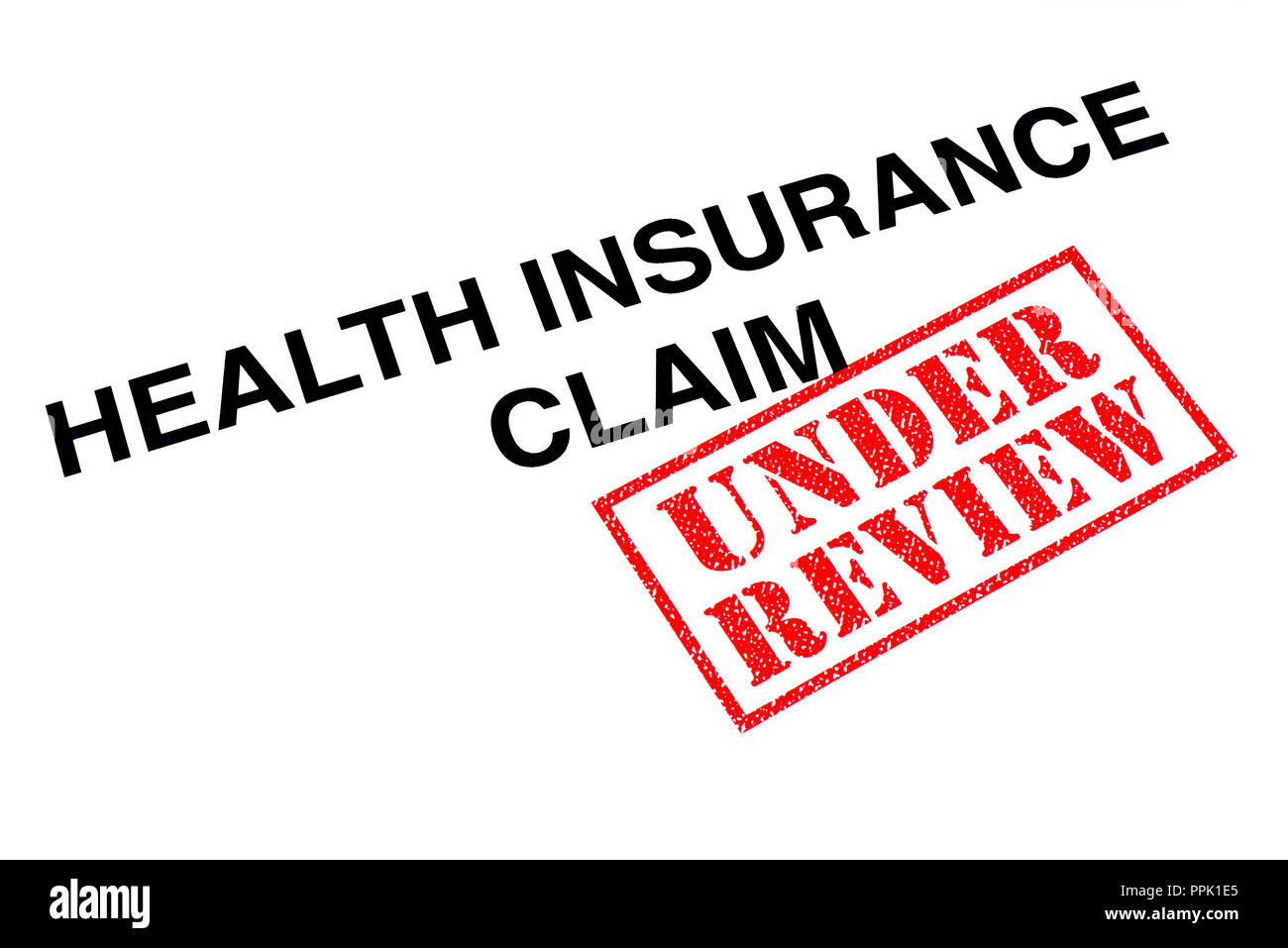 Health Insurance Claim heading stamped with a red UNDER REVIEW rubber ...