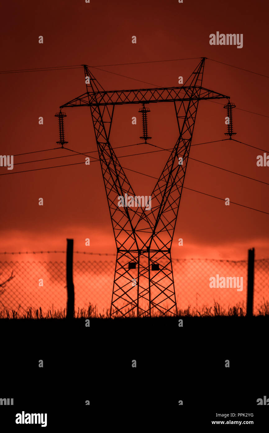 Cinematic horror scenario, deep red sky, with massive black clouds ...