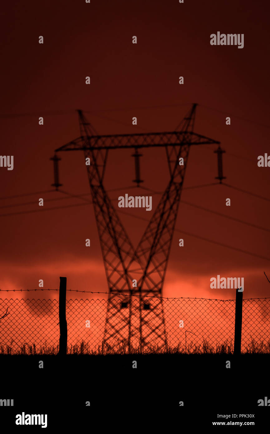 Cinematic horror scenario, deep red sky, with massive black clouds ...