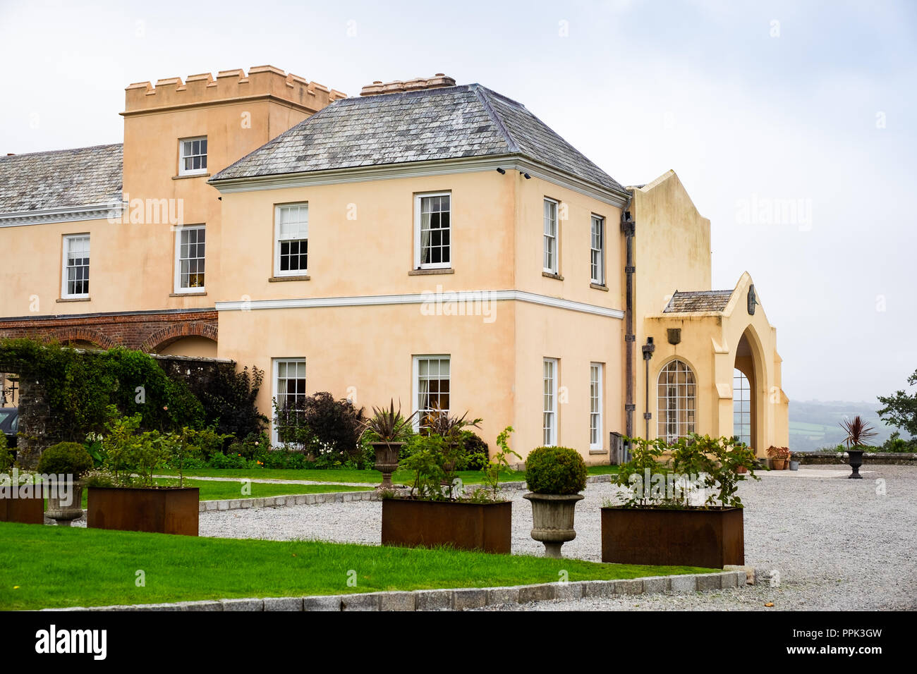 Pale peach facade of Pentillie Castle and Estate near Saltash ...