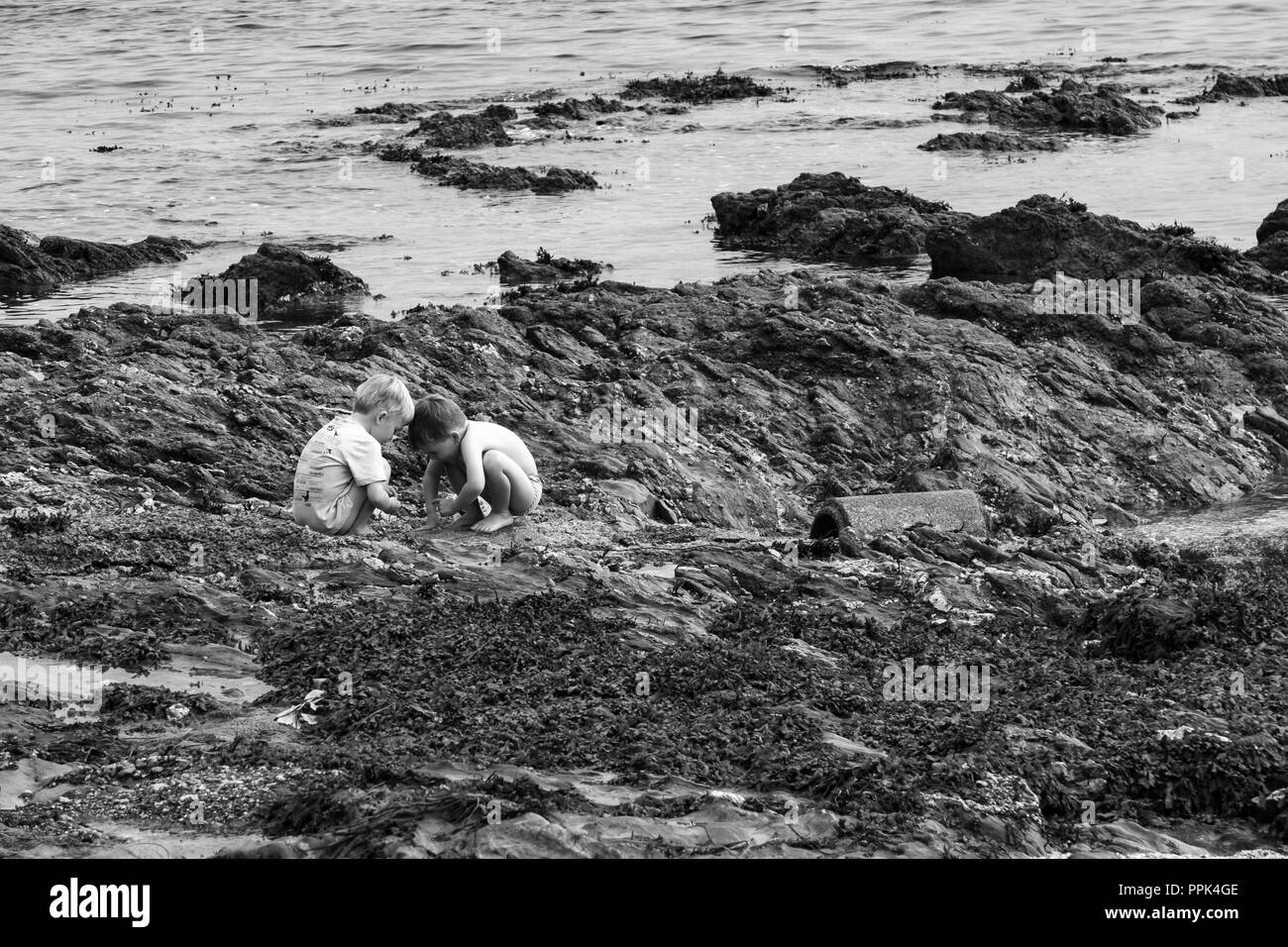 Children Exploring Rocks High Resolution Stock Photography and Images ...