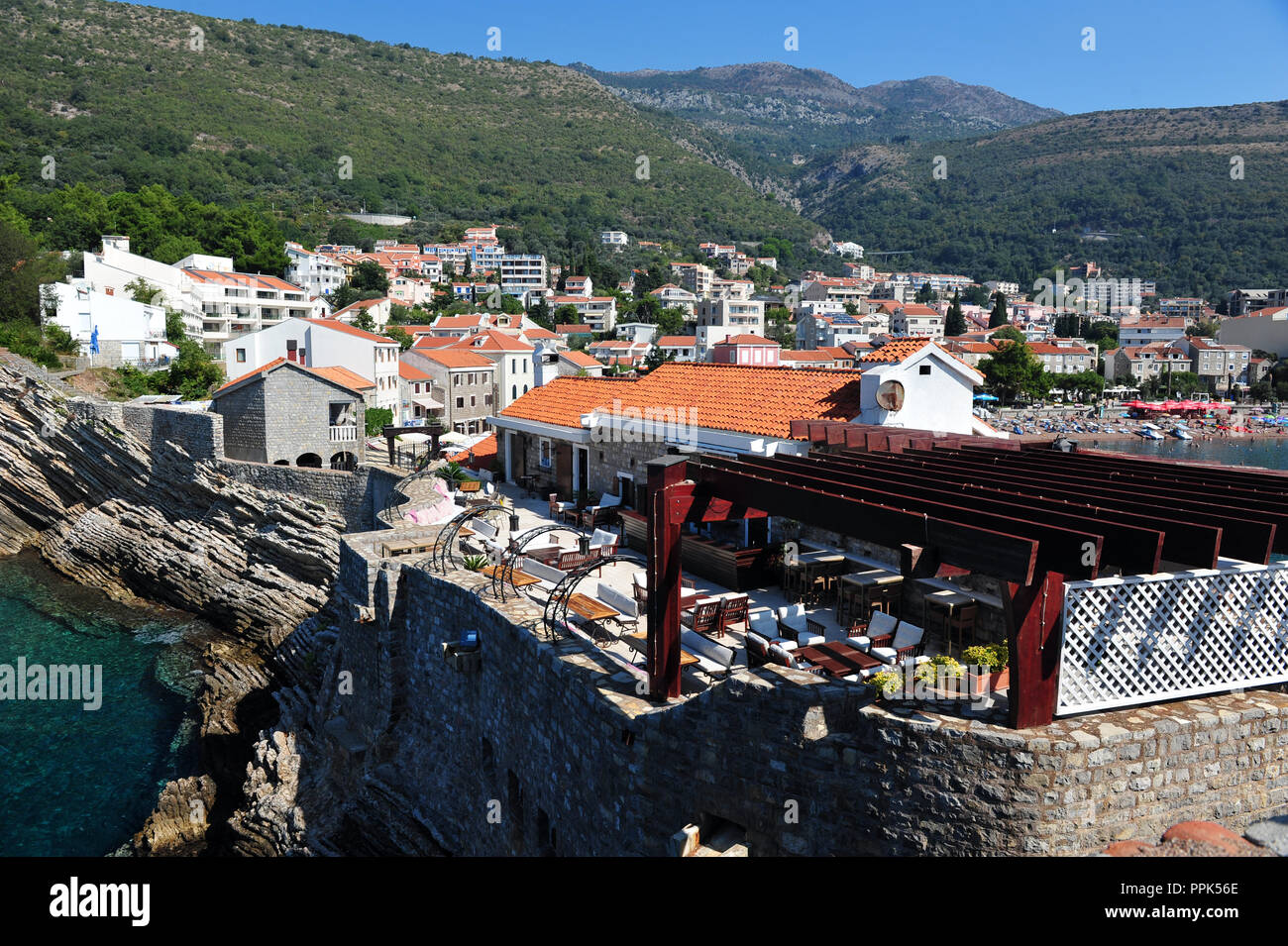 Petrovac, Montenegro shot from the seaside with mountains in the ...