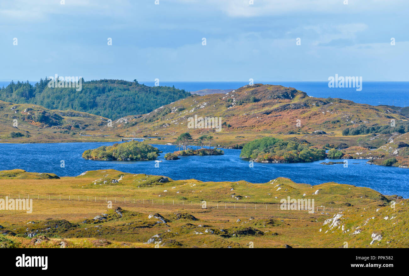 SUILVEN SUTHERLAND SCOTLAND FISHING BOATS AND AUTUMN COLOURS ON LOCH ...