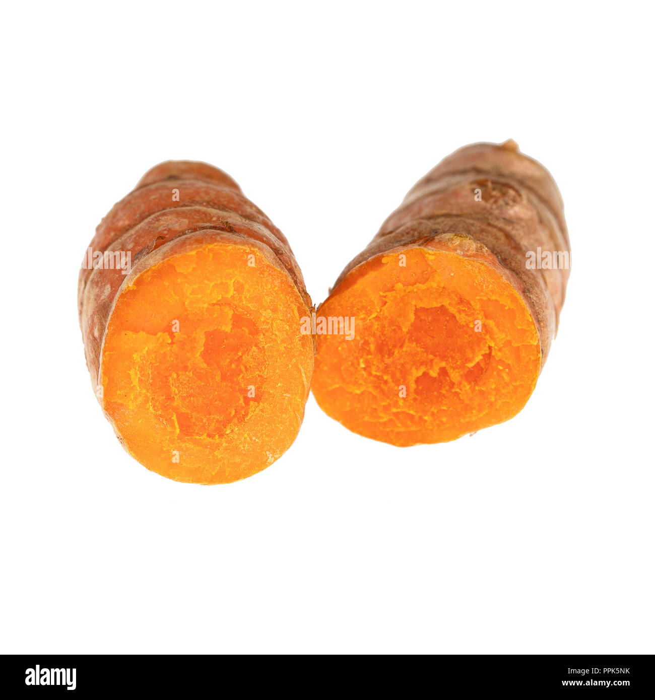 Turmeric root cut in half and isolated on white background Stock Photo ...