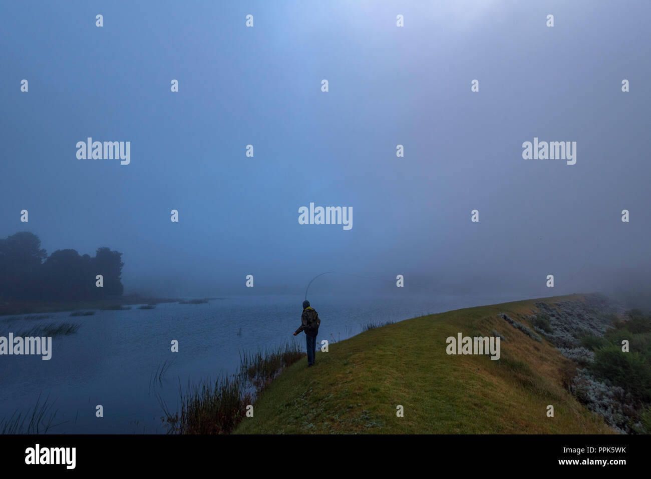 Fishing in bad weather hi-res stock photography and images - Alamy