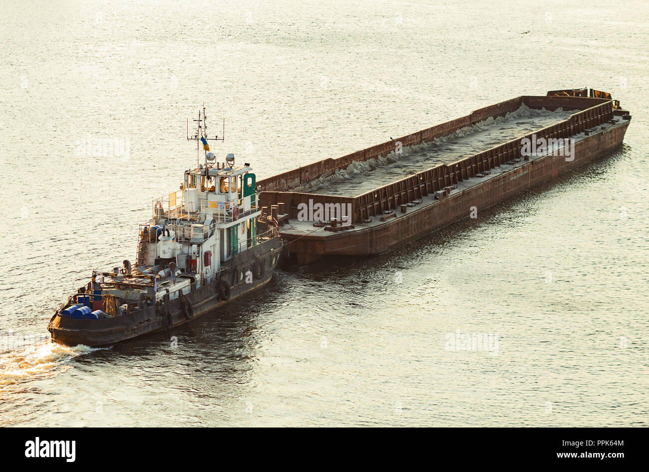 Barge on the river. Vessel on sunset Stock Photo - Alamy