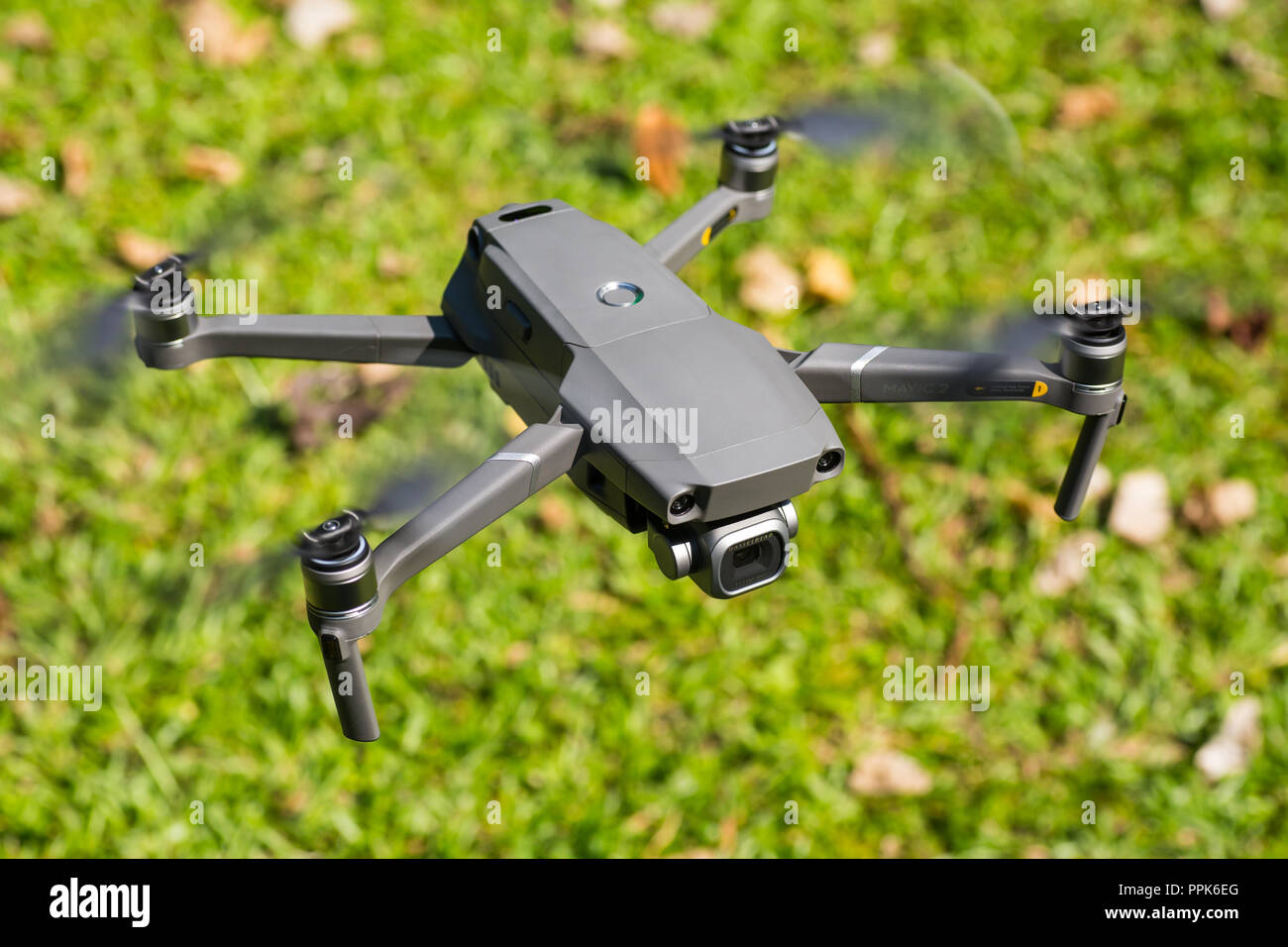 Top down view of Mavic 2 pro hovering against a green background Stock ...