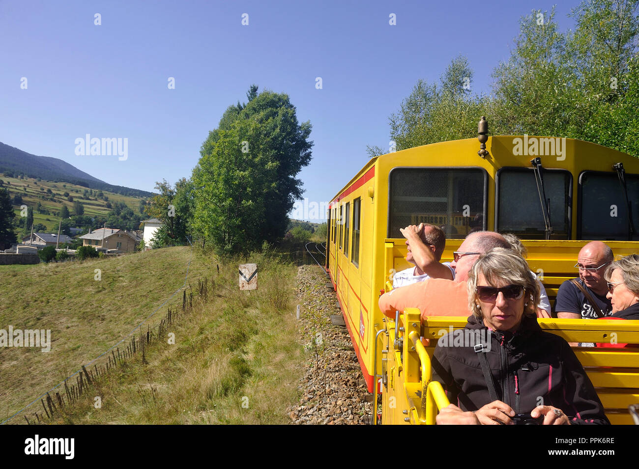 The little yellow train of the Pyrenees Crossing mountain landscapes ...
