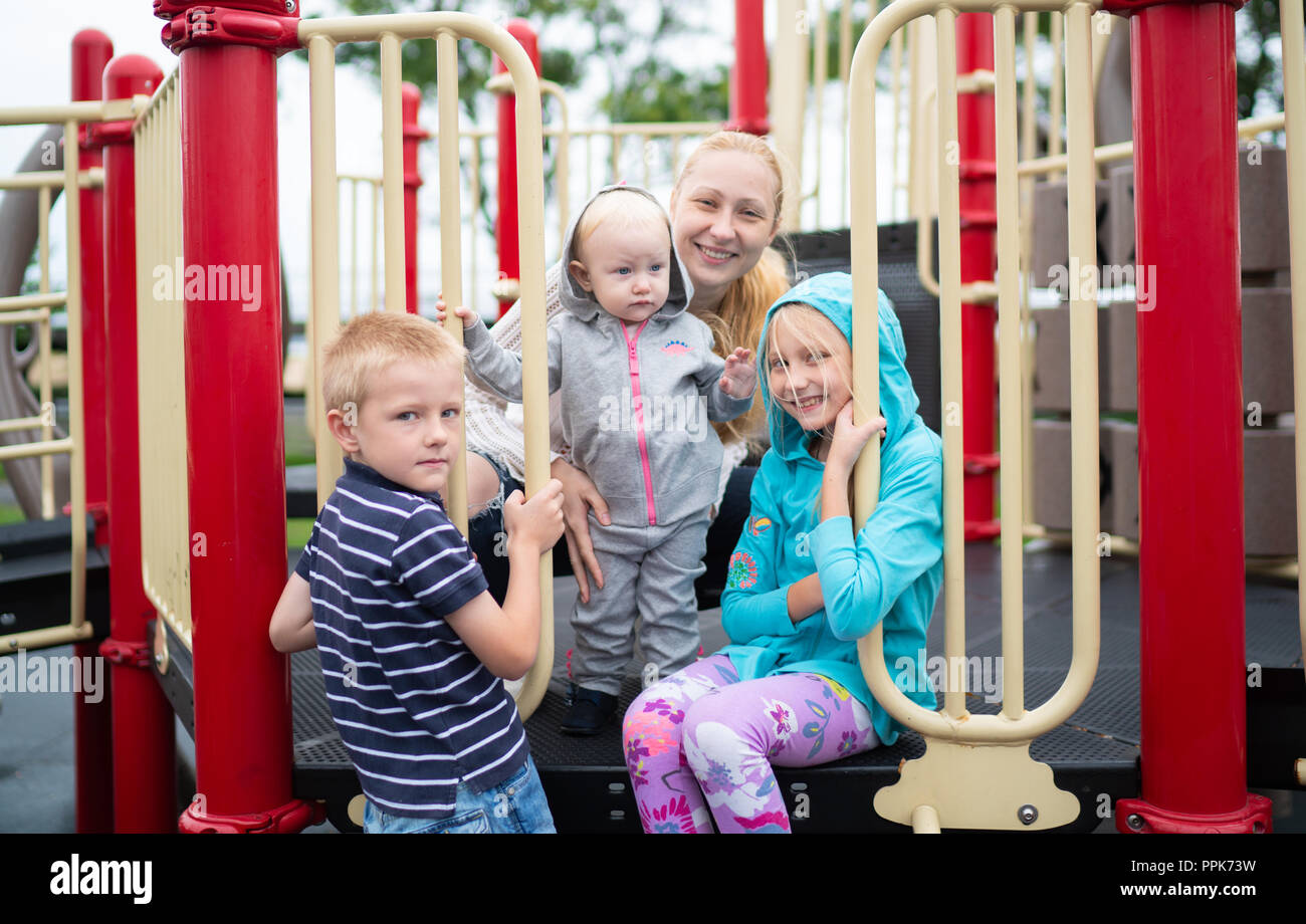 Children playing at playground Stock Photo - Alamy