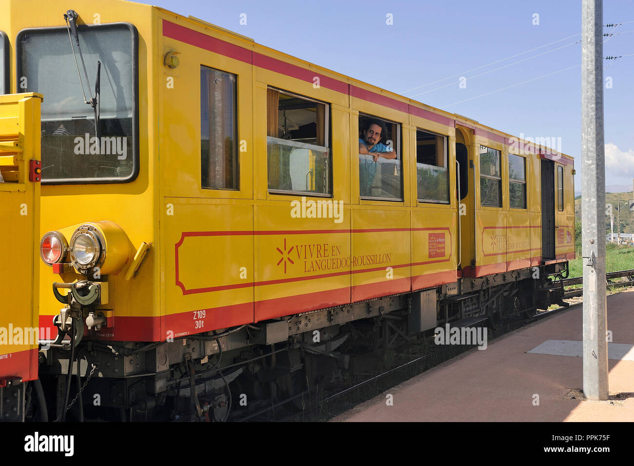 The little yellow train of the Pyrenees waiting for the departure in ...