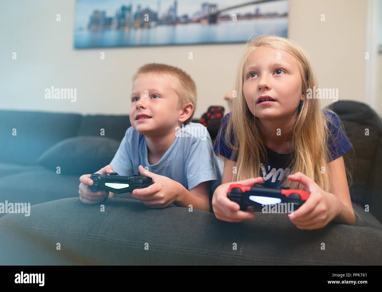 Children playing video games Stock Photo - Alamy