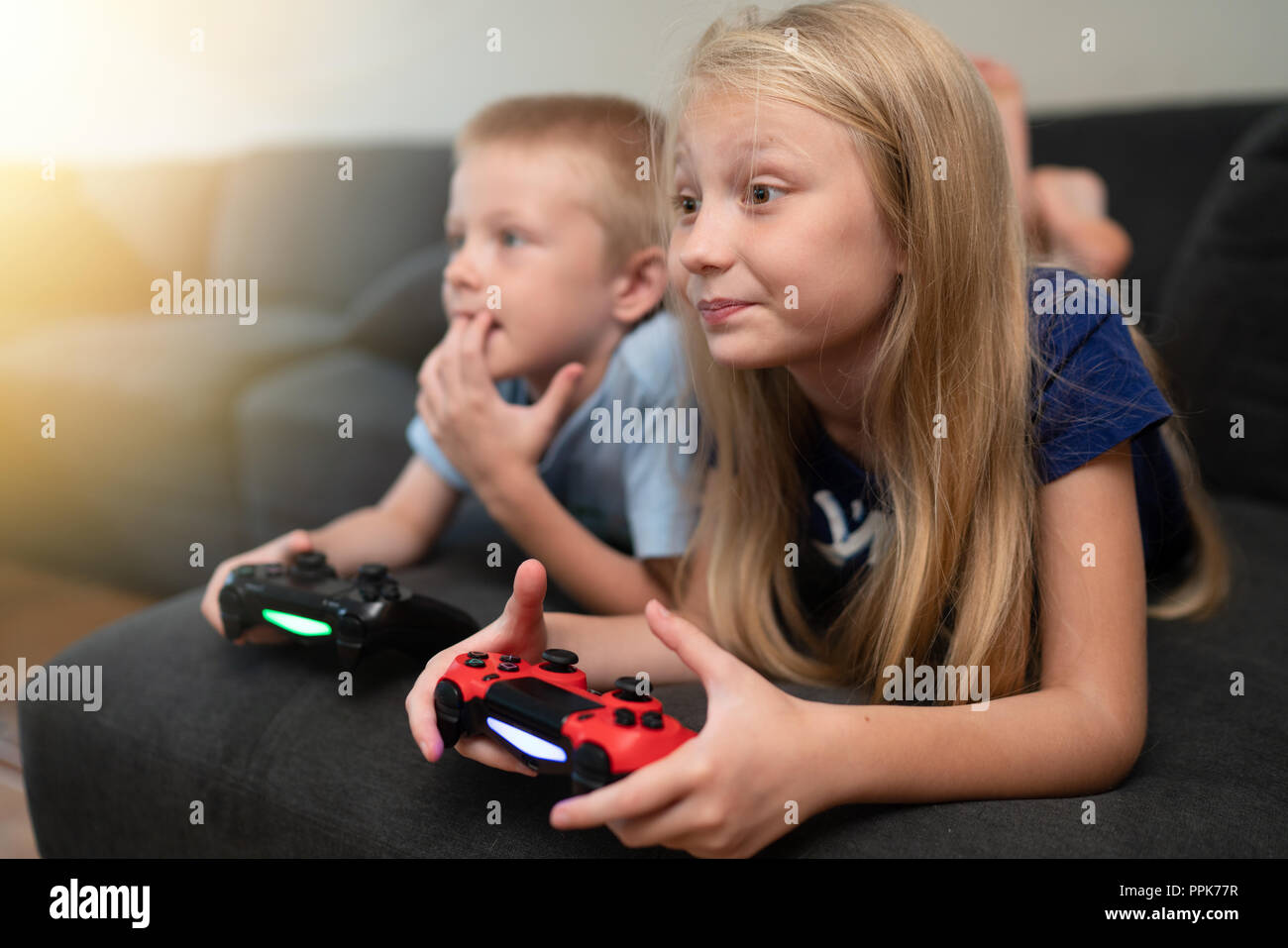 Children playing video games Stock Photo - Alamy