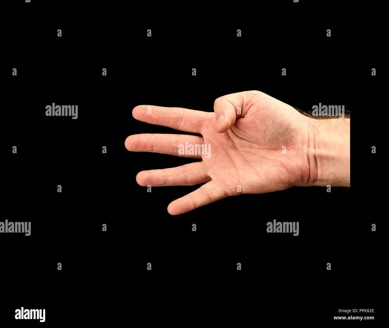 Male hand shows score or number four isolated on black background Stock ...