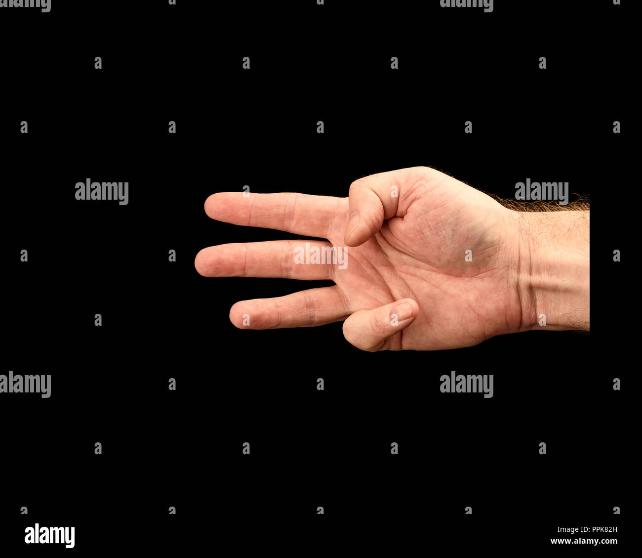 Hand showing three fingers close up hi-res stock photography and images ...