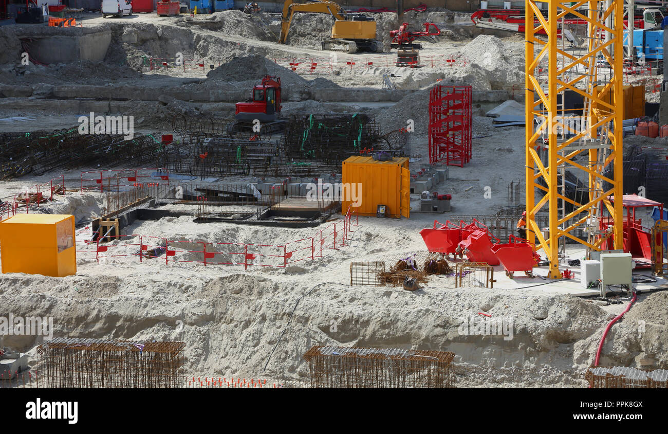 construction site under construction with workers and machines at work ...