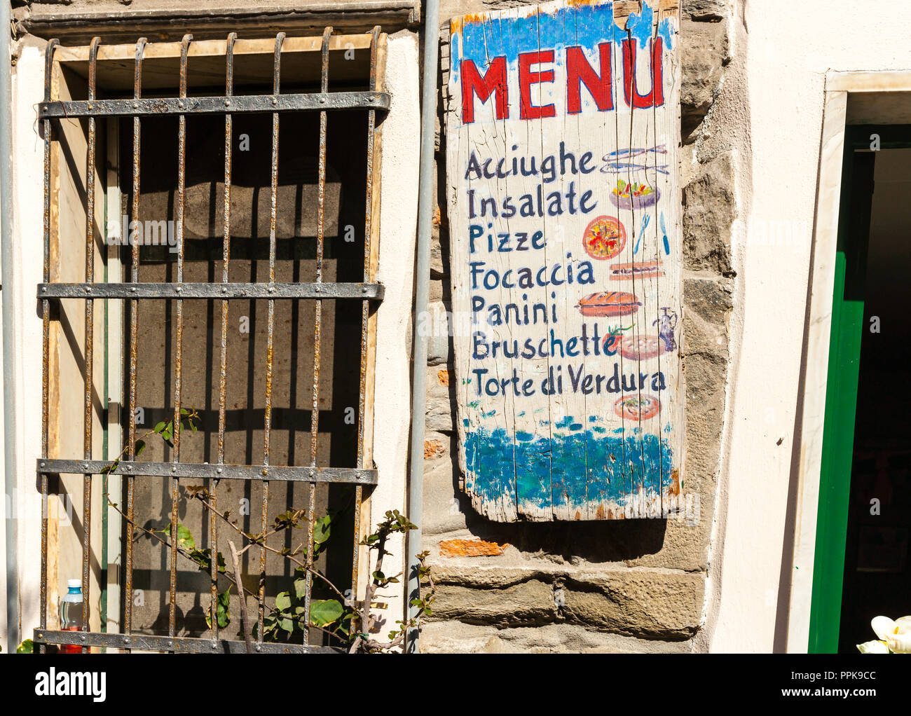 VERNAZZA, ITALY - APRIL 26 2011; Italian village typical pizzeria food ...