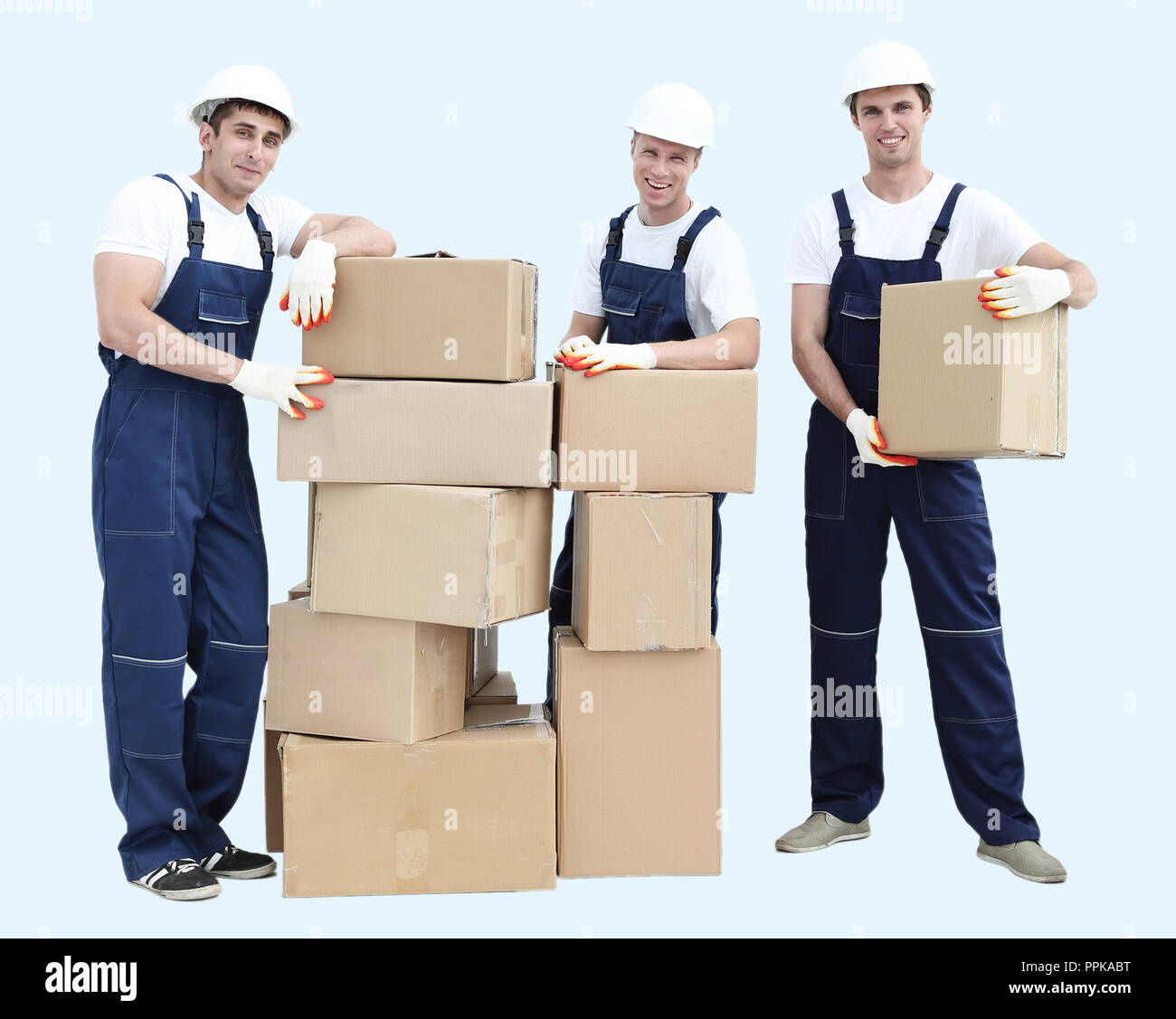 Group of people builders with boxes Stock Photo - Alamy