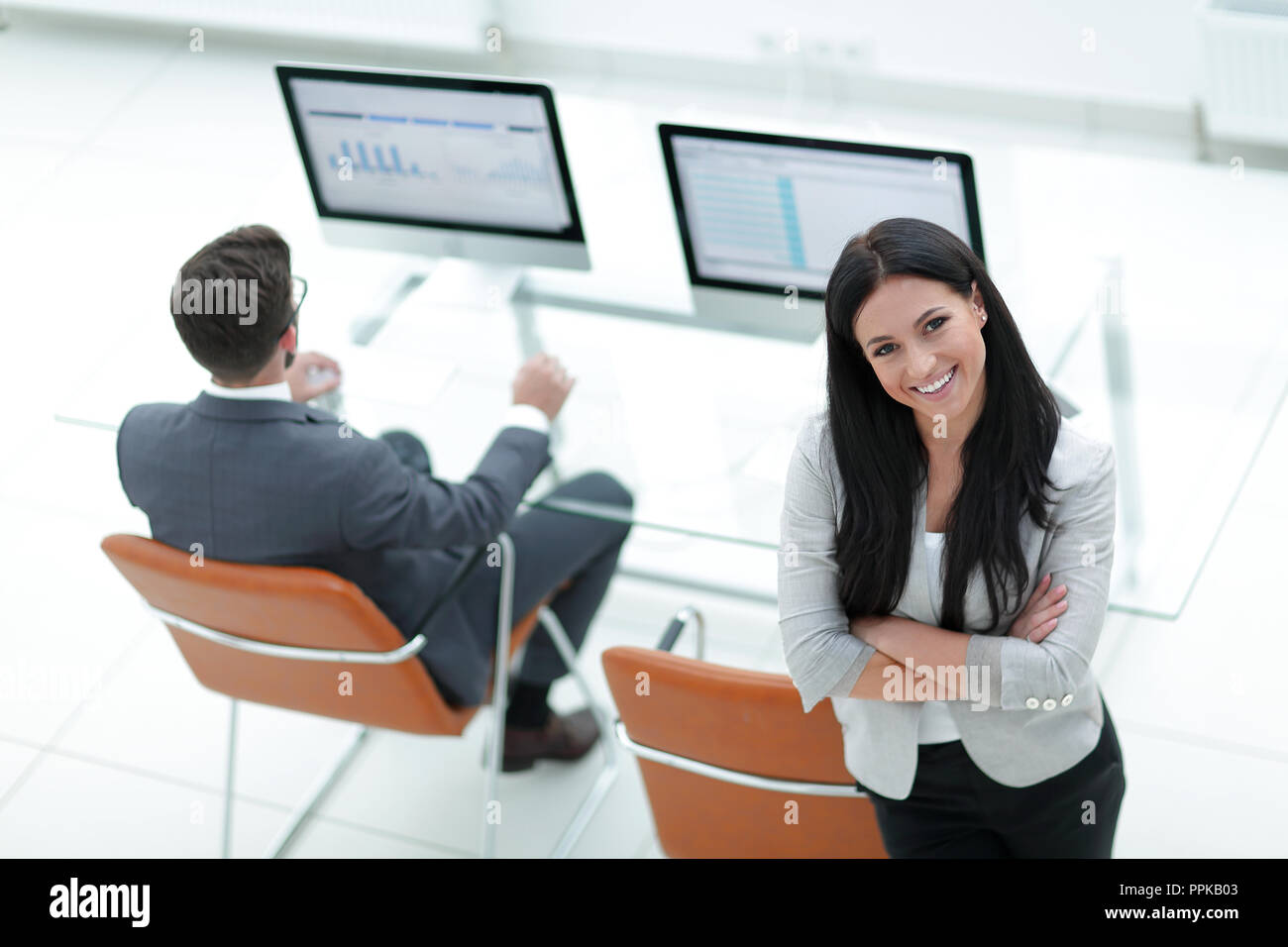 successful business woman standing near modern workplace Stock Photo ...