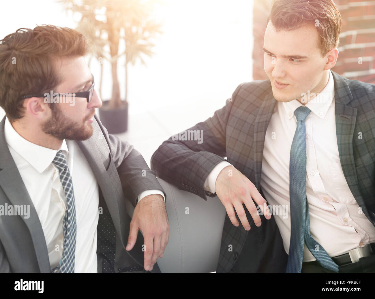 business partners talking at the office Stock Photo - Alamy