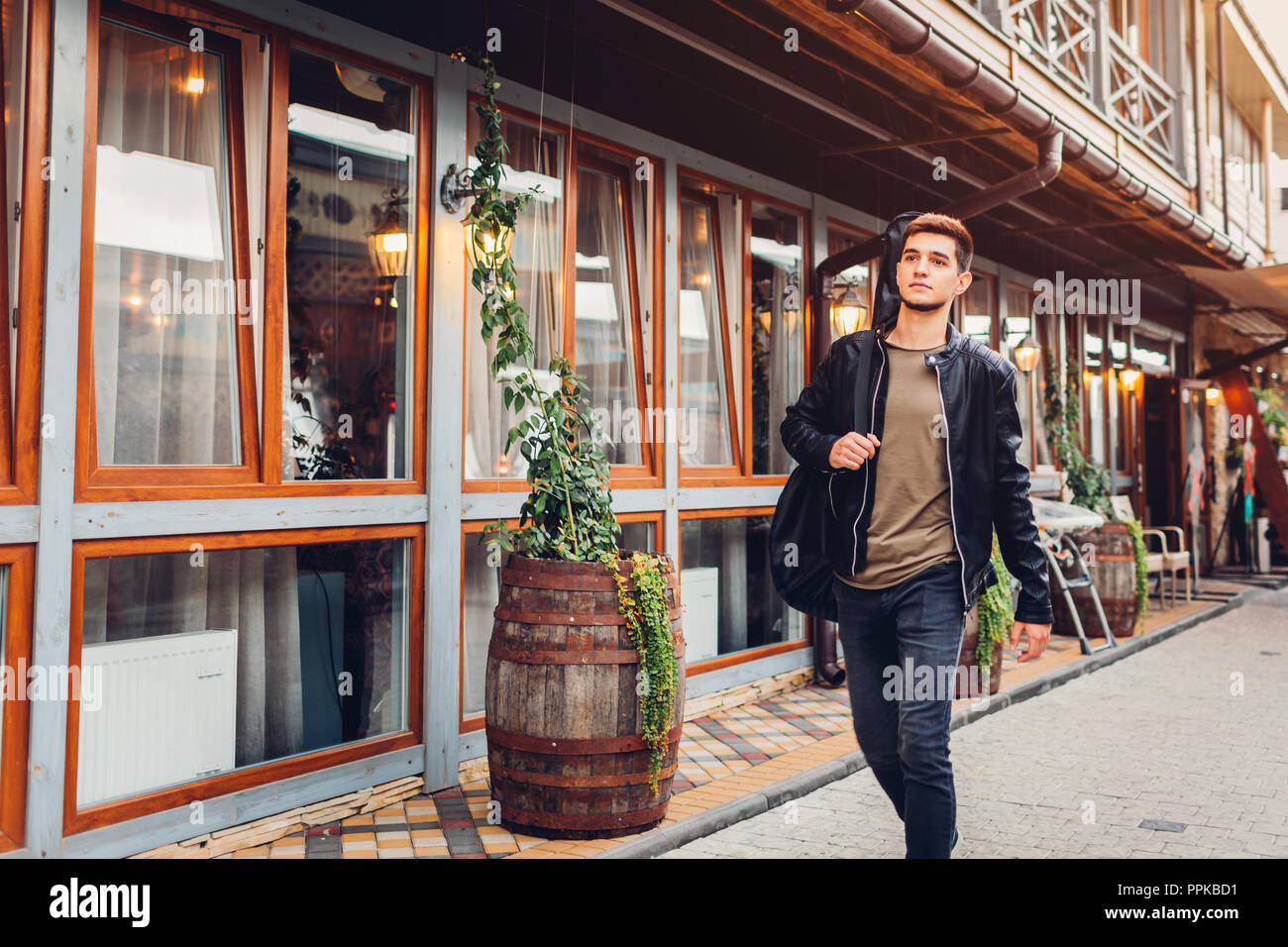 Man carrying musical instrument hi-res stock photography and images - Alamy