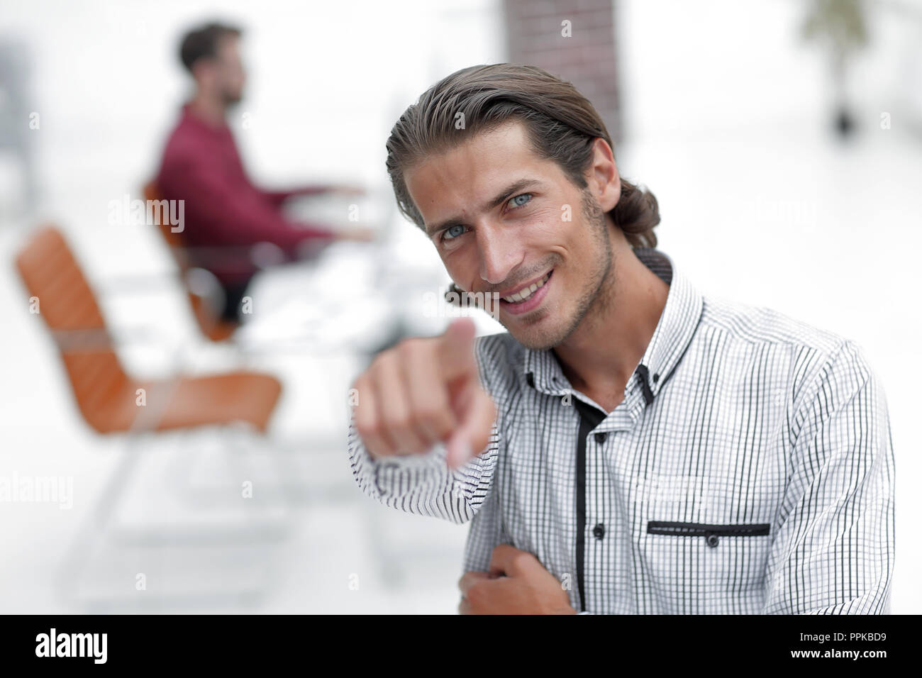 successful man pointing his finger forward Stock Photo - Alamy