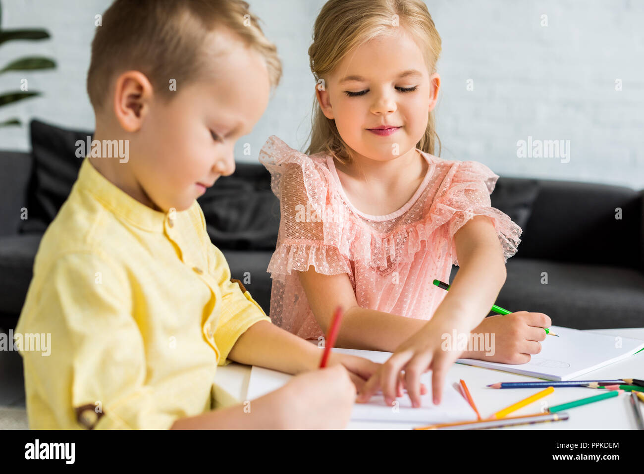 Adorable siblings hi-res stock photography and images - Alamy