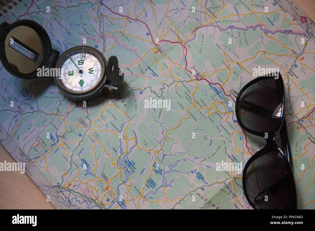Preparations for a trip, some sunglasses, a good map and a good compass ...