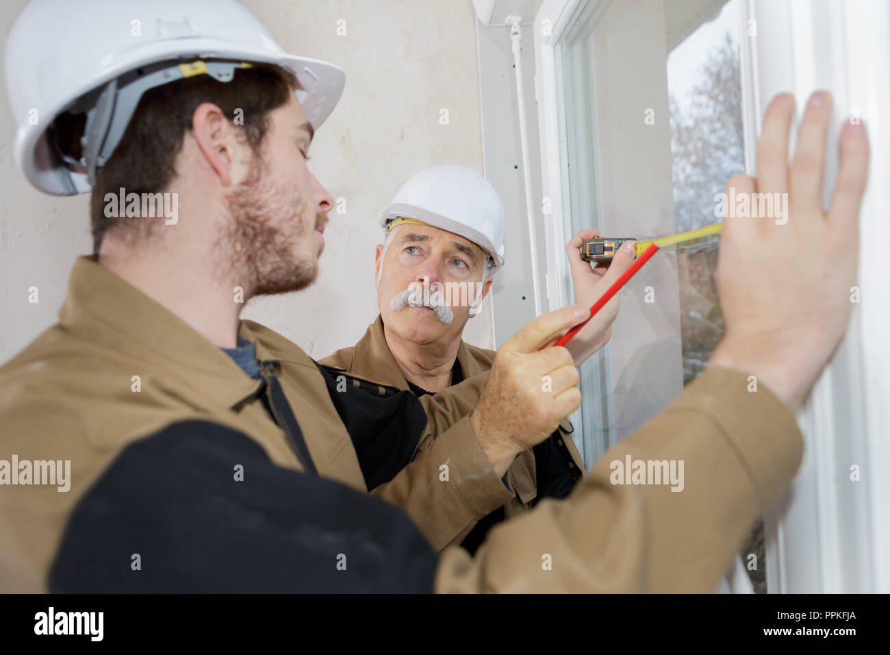 windows installation workers Stock Photo - Alamy